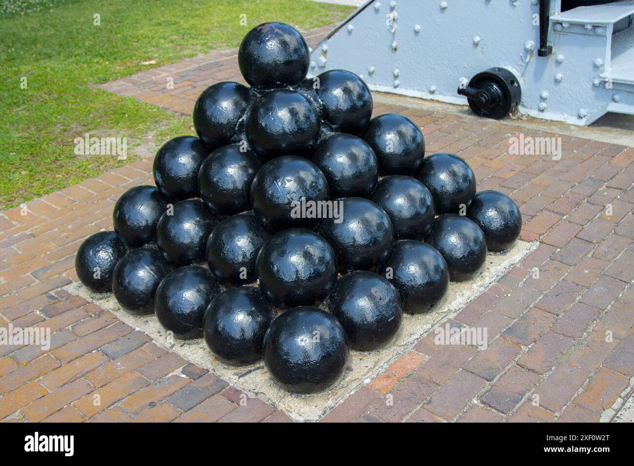 A stack of cannonballs Stock Photo - Alamy