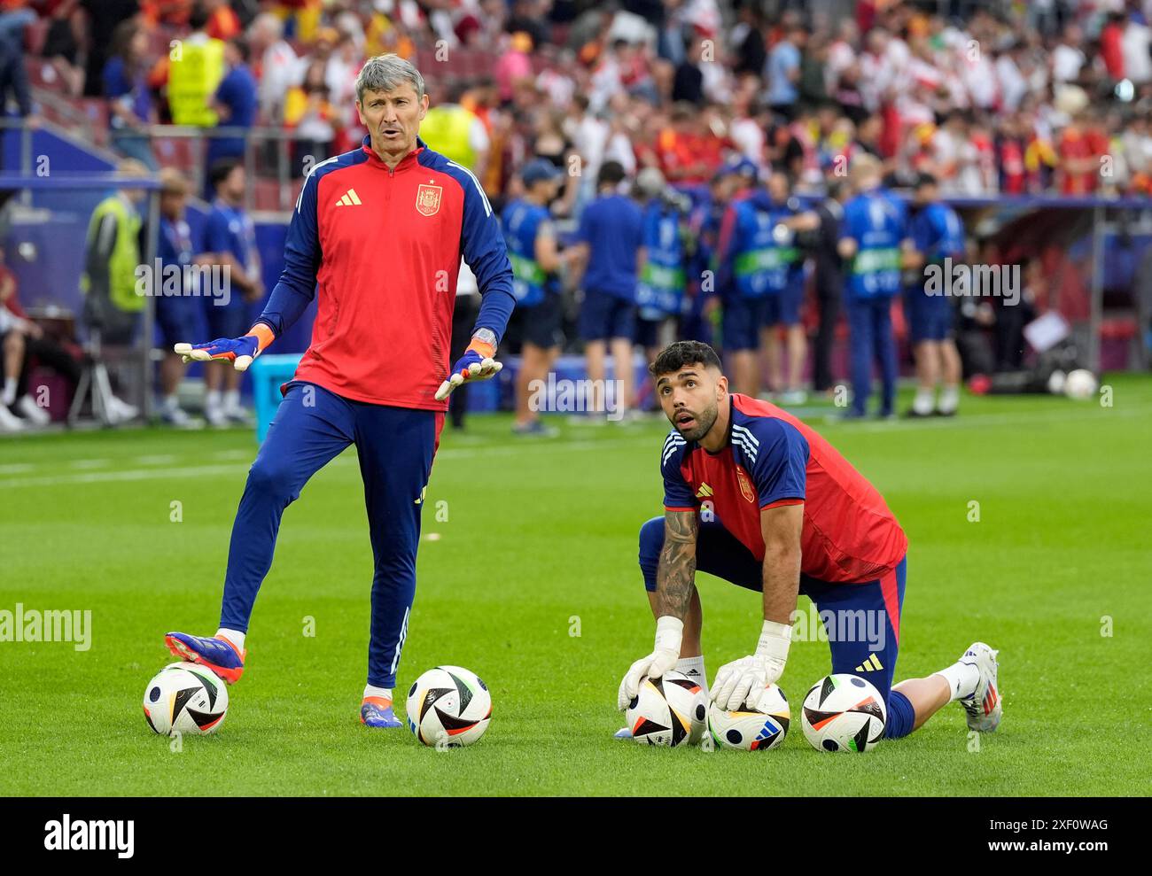 Spain goalkeeping coach Miguel Angel Espana (left) and Spain goalkeeper ...