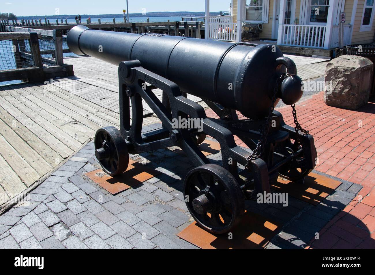 Cannon displayed at the wharf in downtown St. Andrews, New Brunswick ...