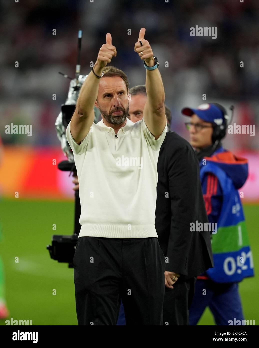 England manager Gareth Southgate gives a thumbs up to fans after the ...