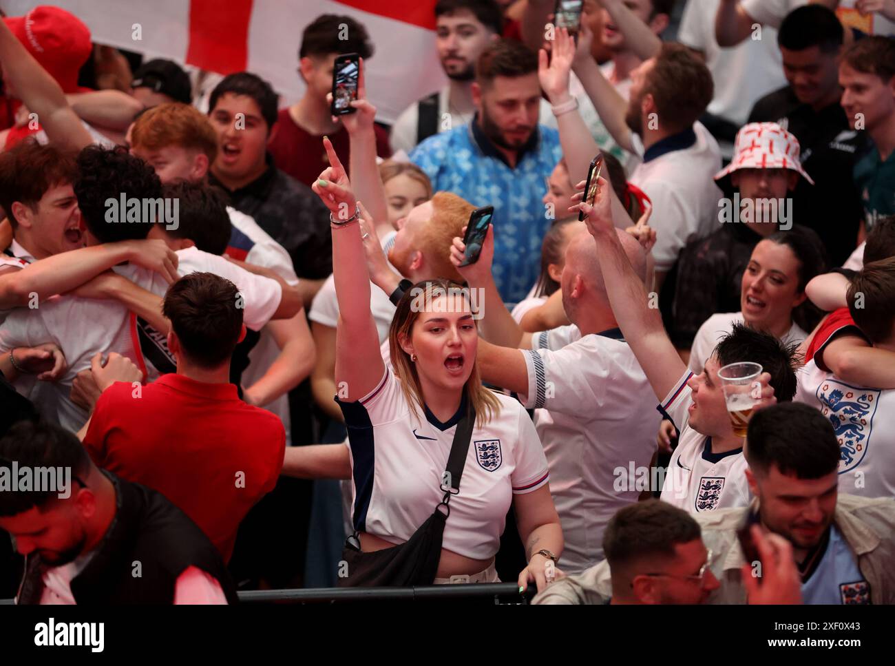 England fans at BOXPark Wembley in London celebrate the win after a ...