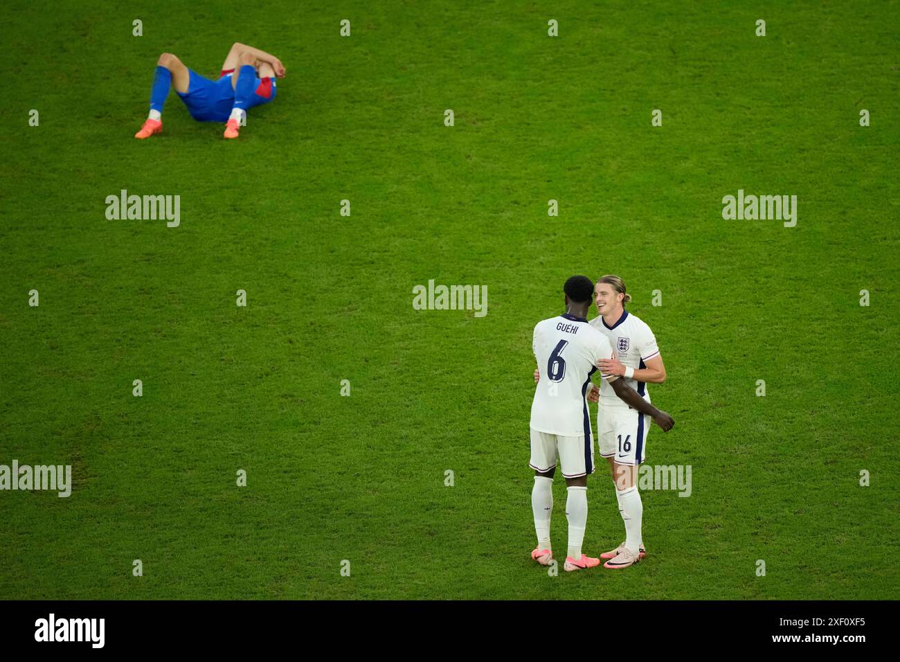 England's Marc Guehi and Conor Gallagher, right, celebrate at the end of a round of sixteen ...