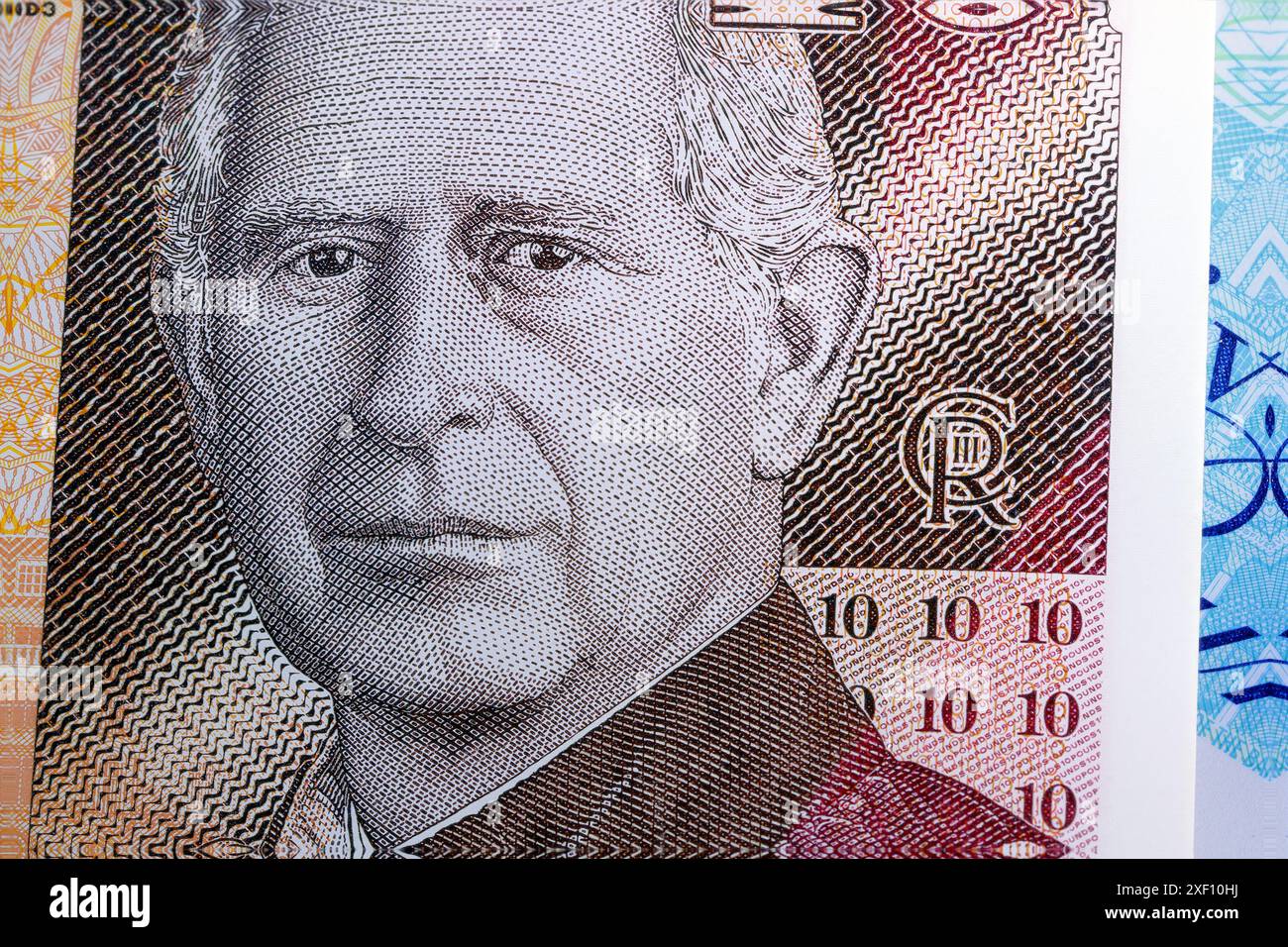 Close up detail of the first banknotes to feature King Charles III that ...