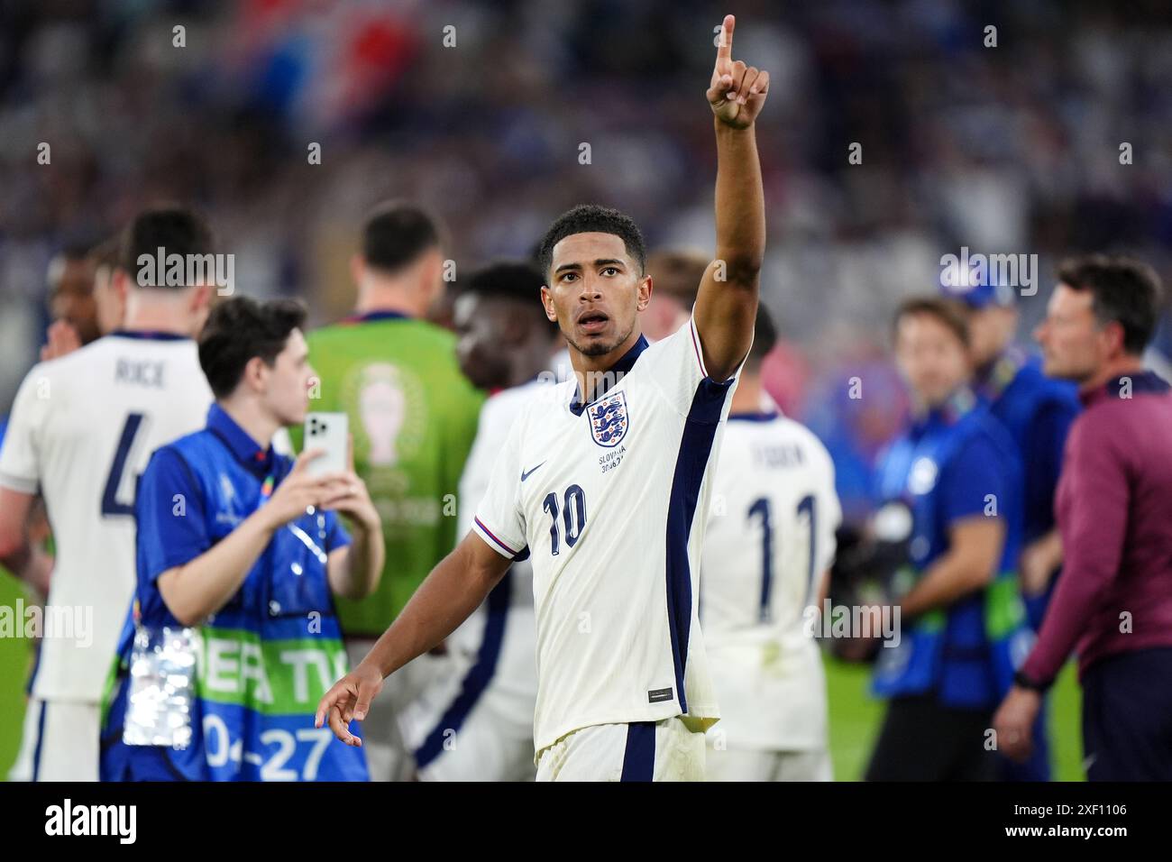 England's Jude Bellingham gestures towards the crowd after winning the ...