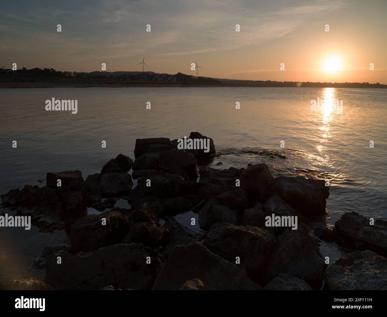 Sea water reflection sun rocks hi-res stock photography and images - Alamy