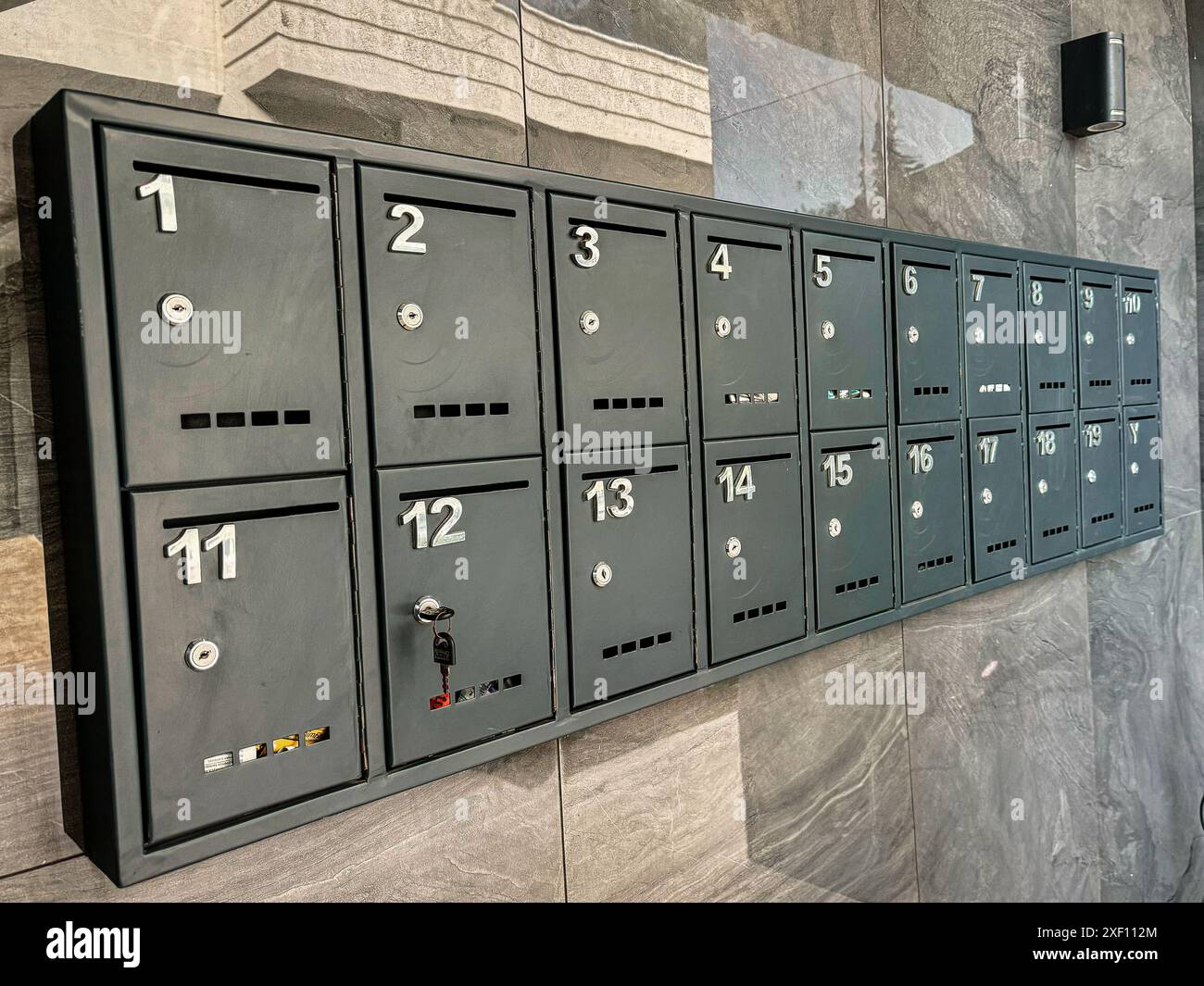 small mailboxes on the wall Stock Photo - Alamy