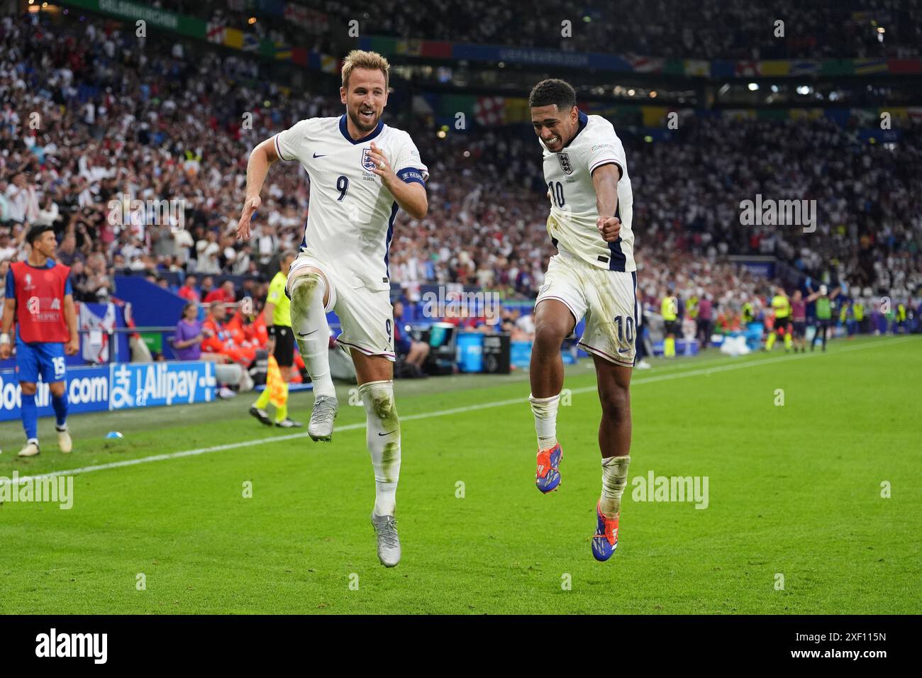 England's Harry Kane celebrates with Jude Bellingham after scoring ...