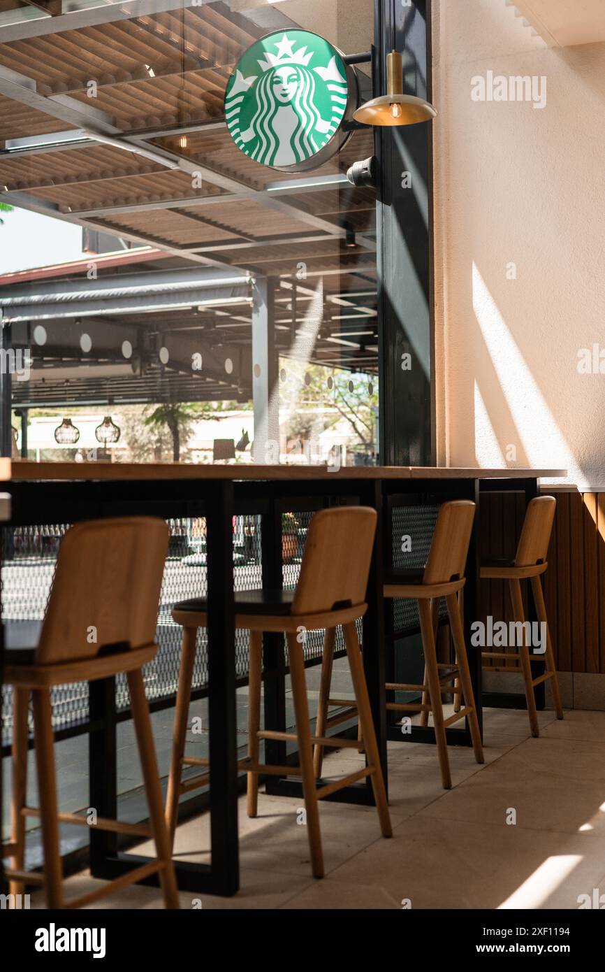 Starbucks cafe, bar stools by the window Stock Photo - Alamy