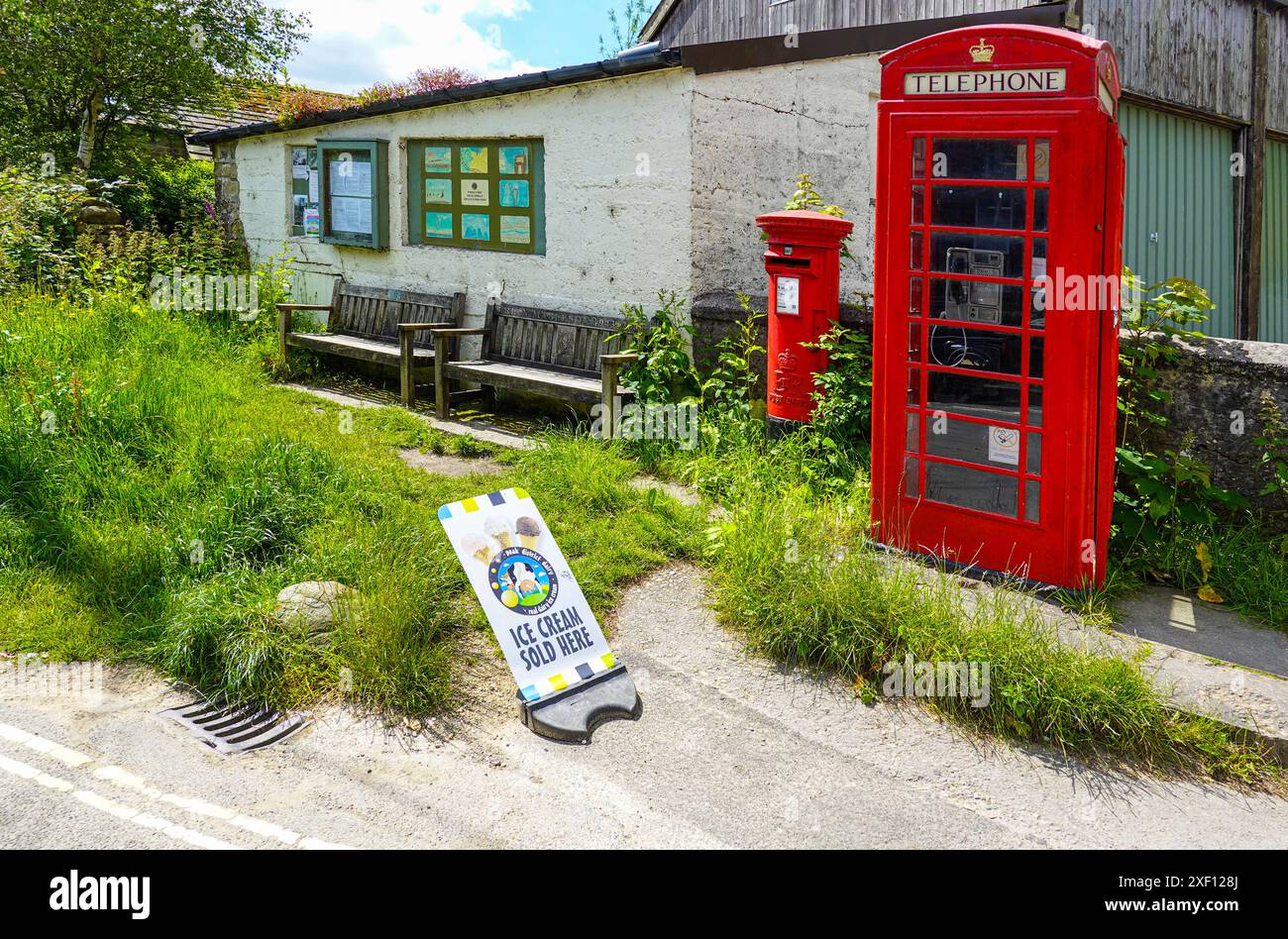 Red post box and red telephone box in Edale village in the Edale Valley ...