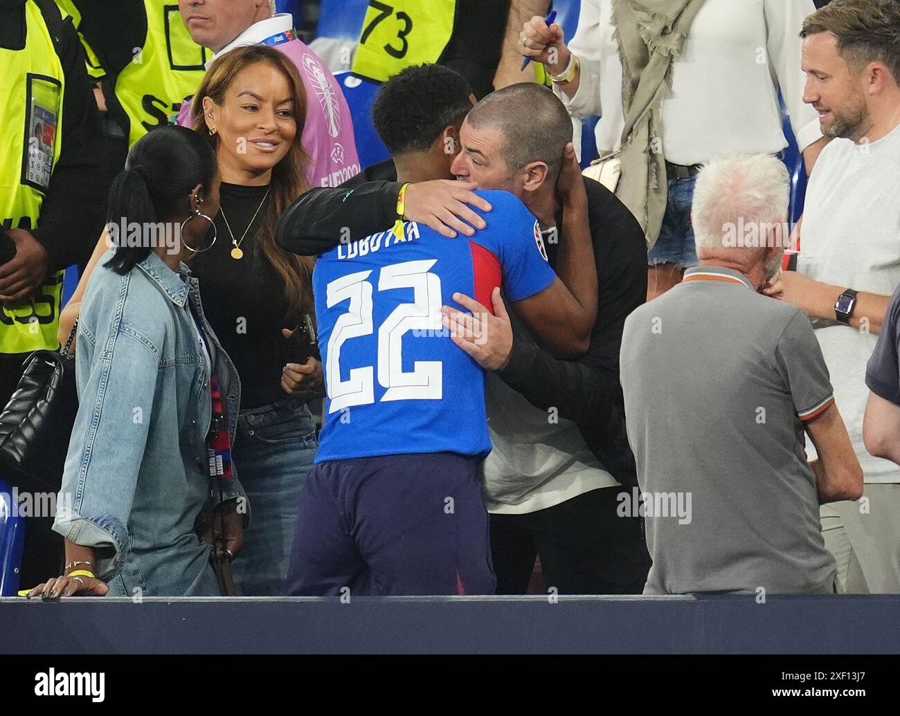 England's Jude Bellingham, wearing a Slovakia shirt, with father Mark ...