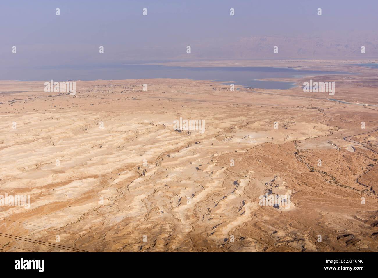 The rocky landscape by the Dead Sea area in front of Masada national ...