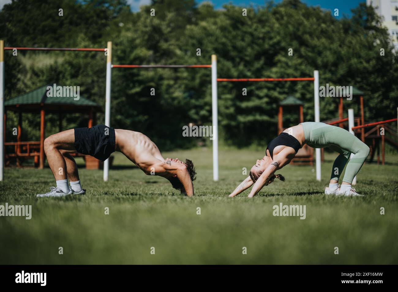 Fitness enthusiasts stretching outdoors hi-res stock photography and ...