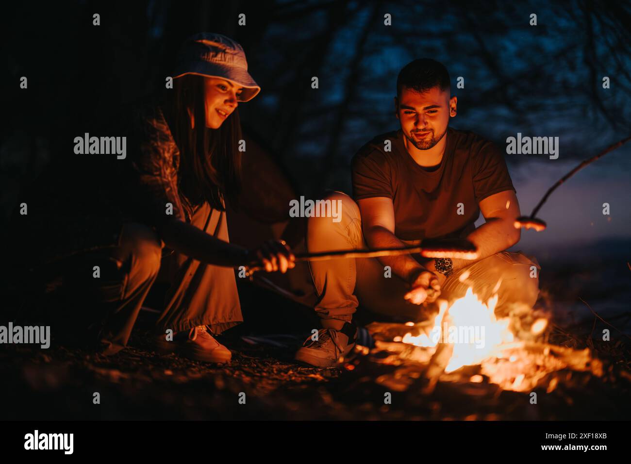 Happy friends enjoying lake dinner hi-res stock photography and images ...
