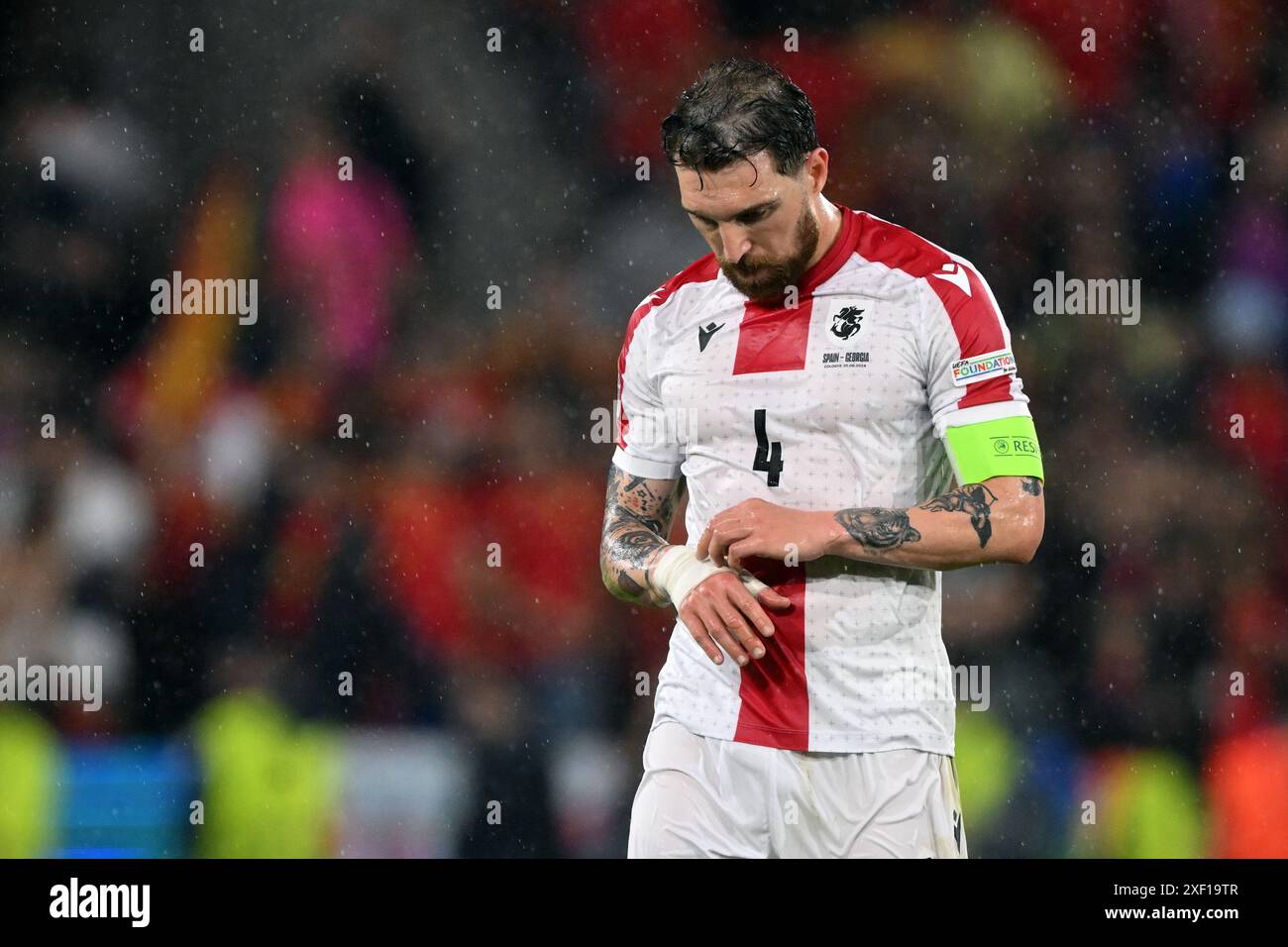 COLOGNE - (l-r) Guram Kashia or Georgie disappointment after the UEFA ...