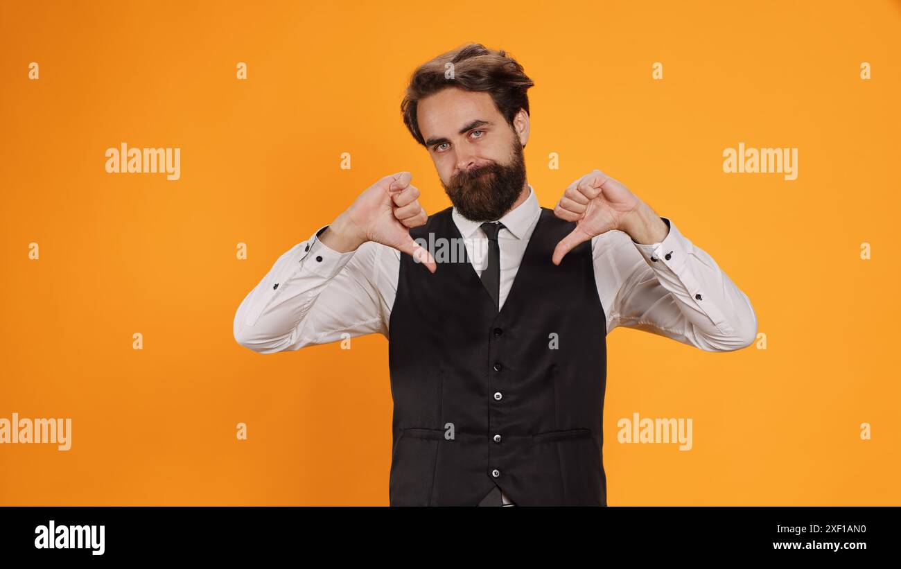 Staff member gives thumbs down on camera, showing negative dislike sign ...