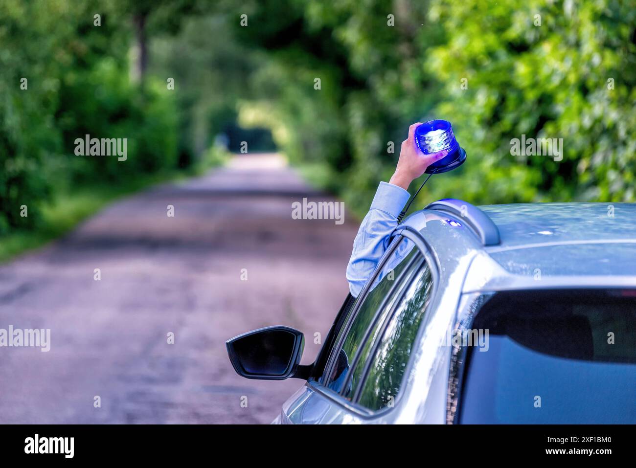 blue flashing light on a police car during a blue light drive Stock ...