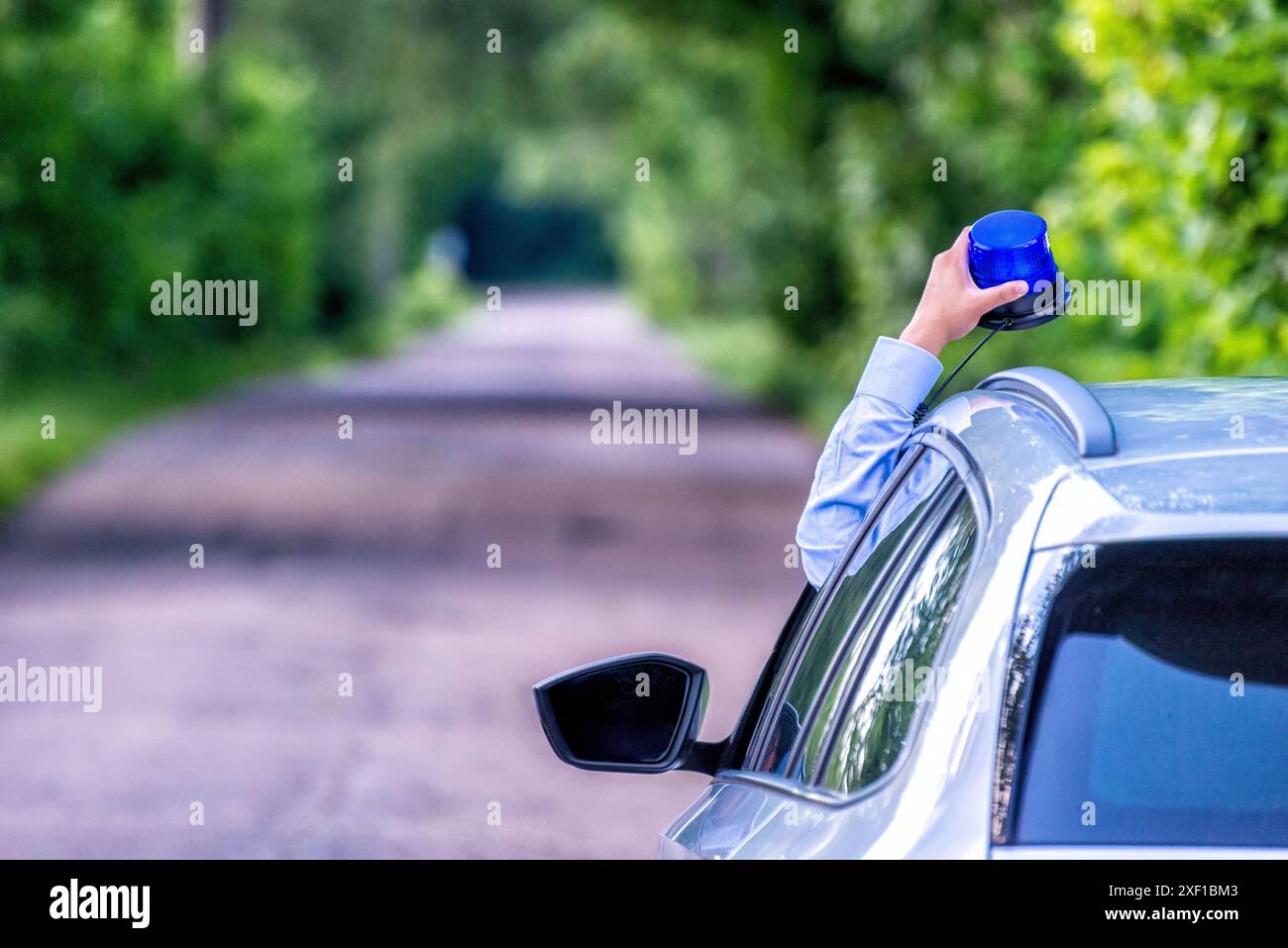 blue flashing light on a police car during a blue light drive Stock ...