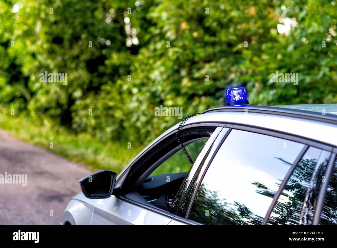 blue flashing light on a police car during a blue light drive Stock ...