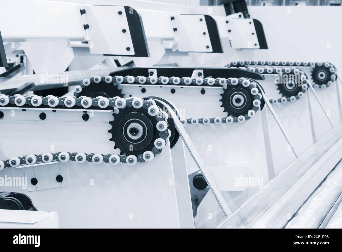 Plastic conveyor rollers close up hi-res stock photography and images ...