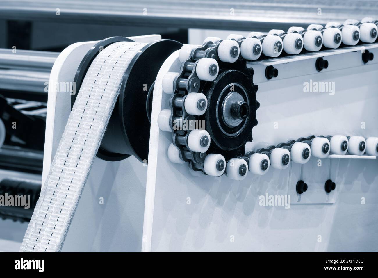 Part of a modern roller conveyor with metal and plastic rollers for the ...