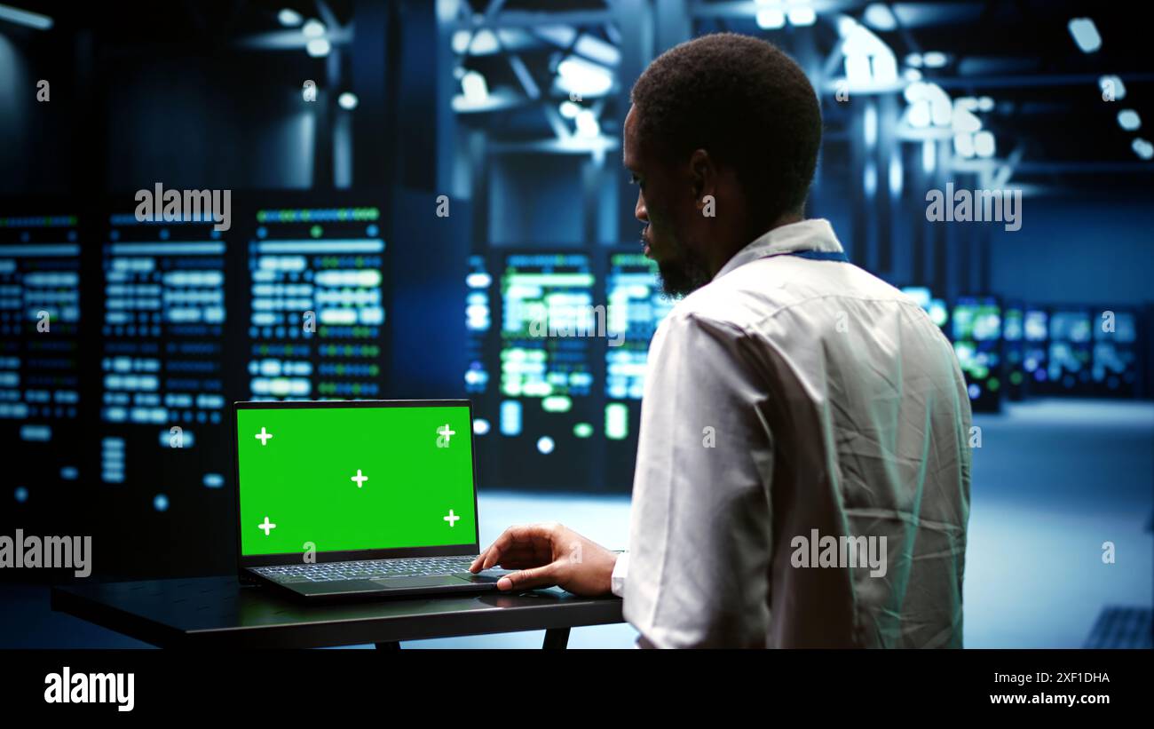 Professional examining server cabinets performance trends. Repairman ...