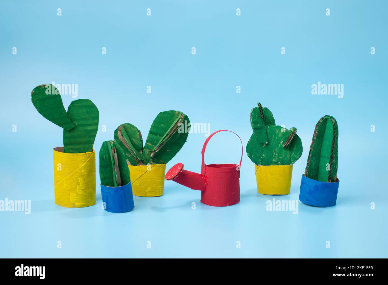 Vibrant watering can and cacti. Kid-friendly paper craft project, DIY ...