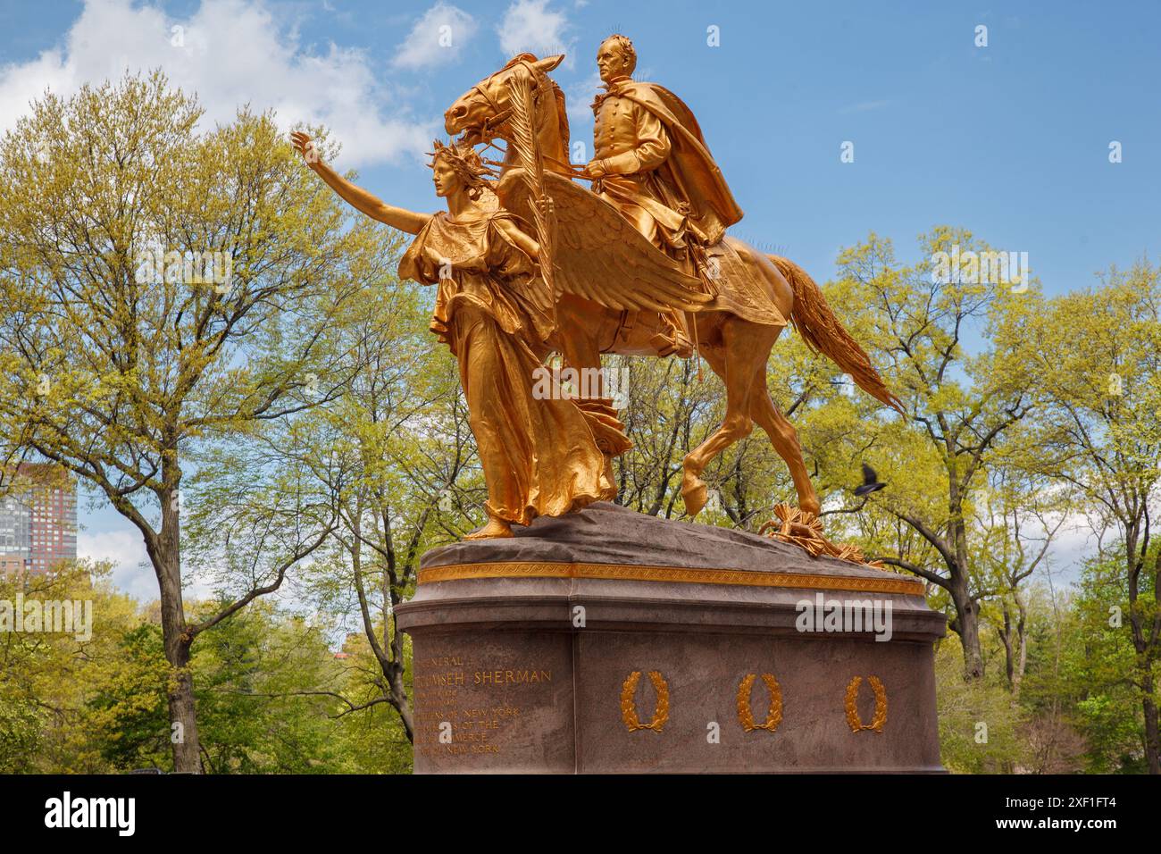 The golden monument of General William Tecumseh Sherman with a guiding ...