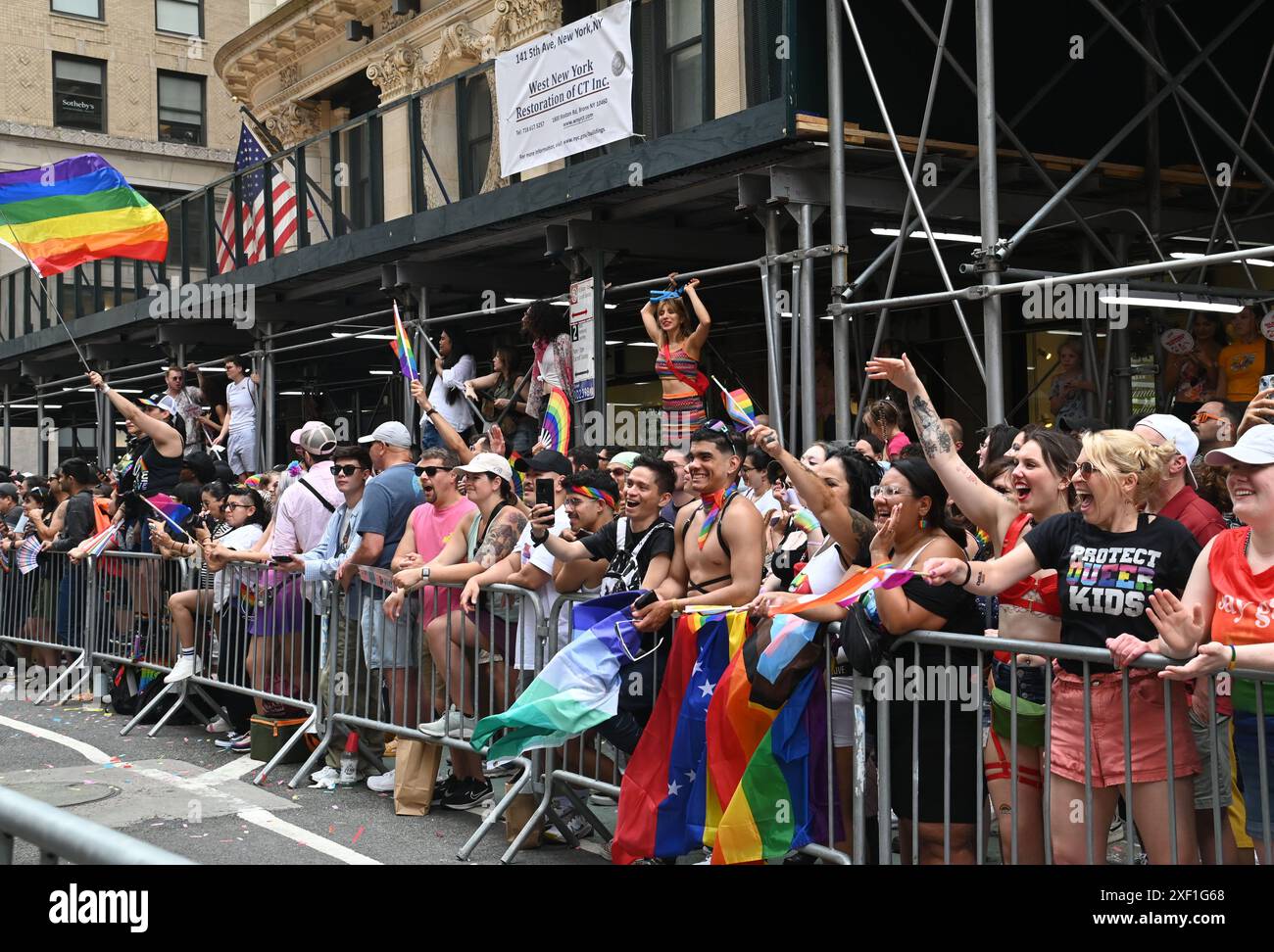 New York, USA. 30th June, 2024. A large crowd gathers on Fifth Avenue ...