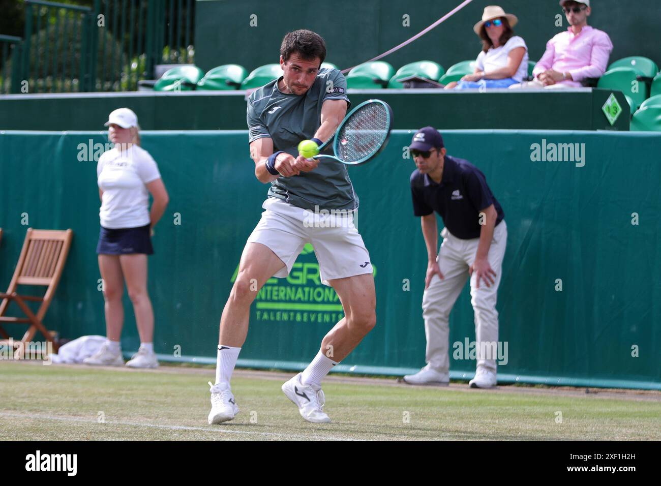 Pedro Martinez returns on his backhand to Alexei Popyrin during the ...
