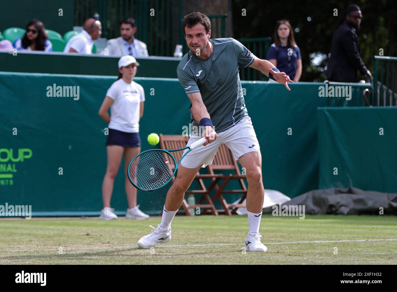 Pedro Martinez plays a forehand against Alexei Popyrin during the ...
