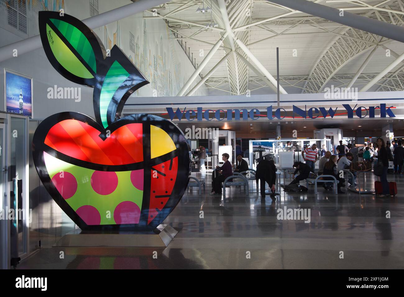 A big apple sculpture by Romero Britto in the main concourse of the JFK ...