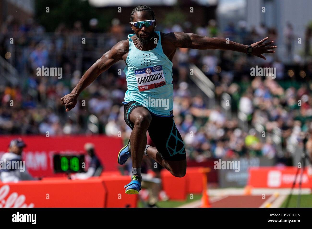 Omar Craddock competes in the men's triple jump final during the U.S ...