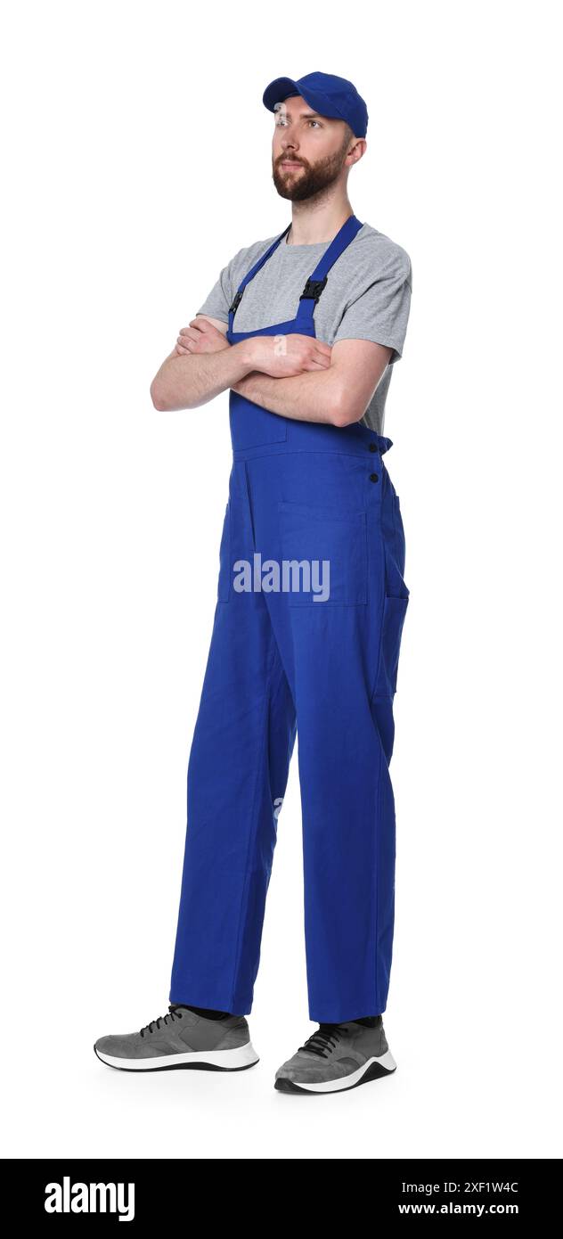 Professional auto mechanic in uniform on white background Stock Photo ...