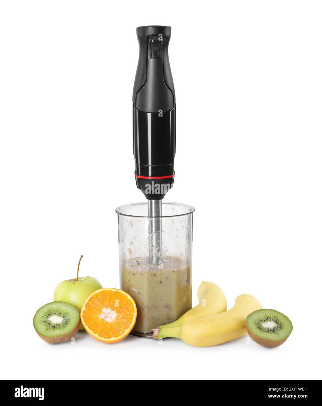 Hand blender with mixture of ingredients and fresh fruits isolated on ...