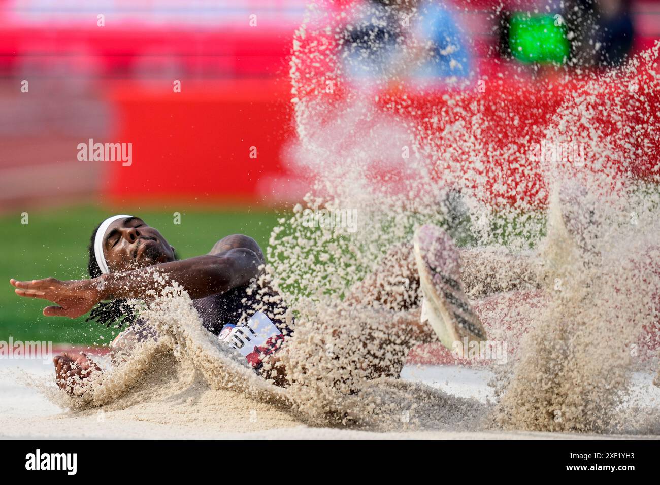 Donald Scott competes in the men's triple jump final during the U.S ...