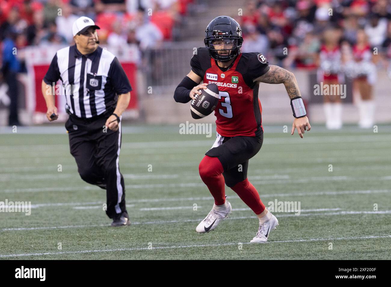 Ottawa, Canada. 30th June, 2024. Ottawa Redblacks quarterback Dru Brown ...