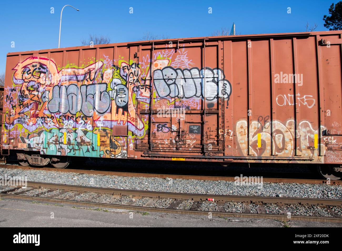 Graffiti tagged on rail cars on Station Street in downtown Saint John ...
