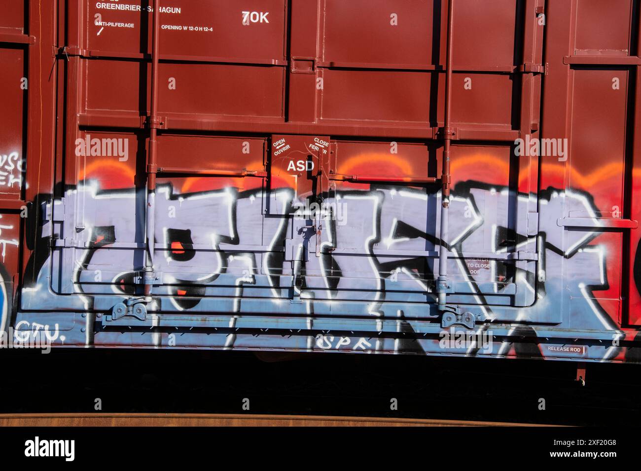 Graffiti tagged on rail cars on Station Street in downtown Saint John ...