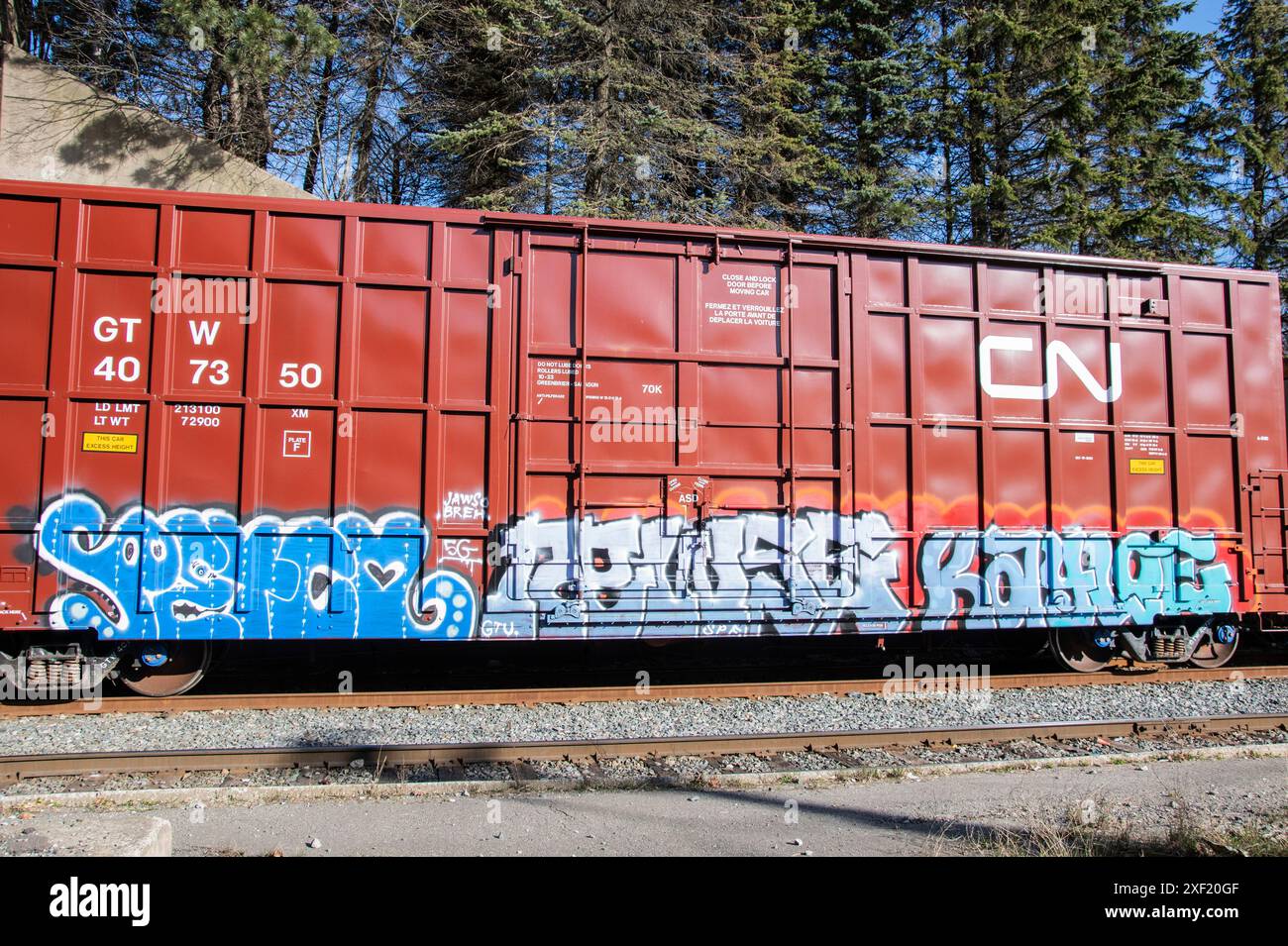 Graffiti tagged on rail cars on Station Street in downtown Saint John ...