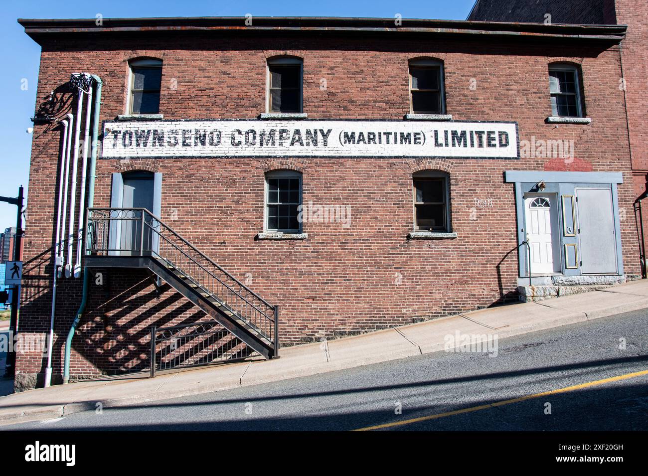Fading remains of Townsend Company (Maritime) Limited sign on Water ...