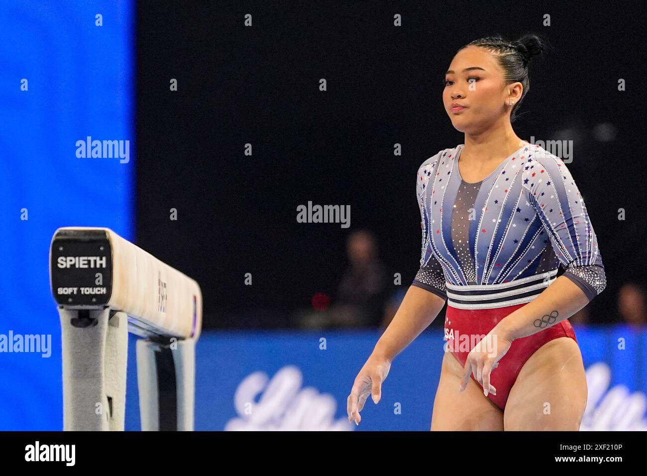 Suni Lee competes on the balance beam at the United States Gymnastics ...