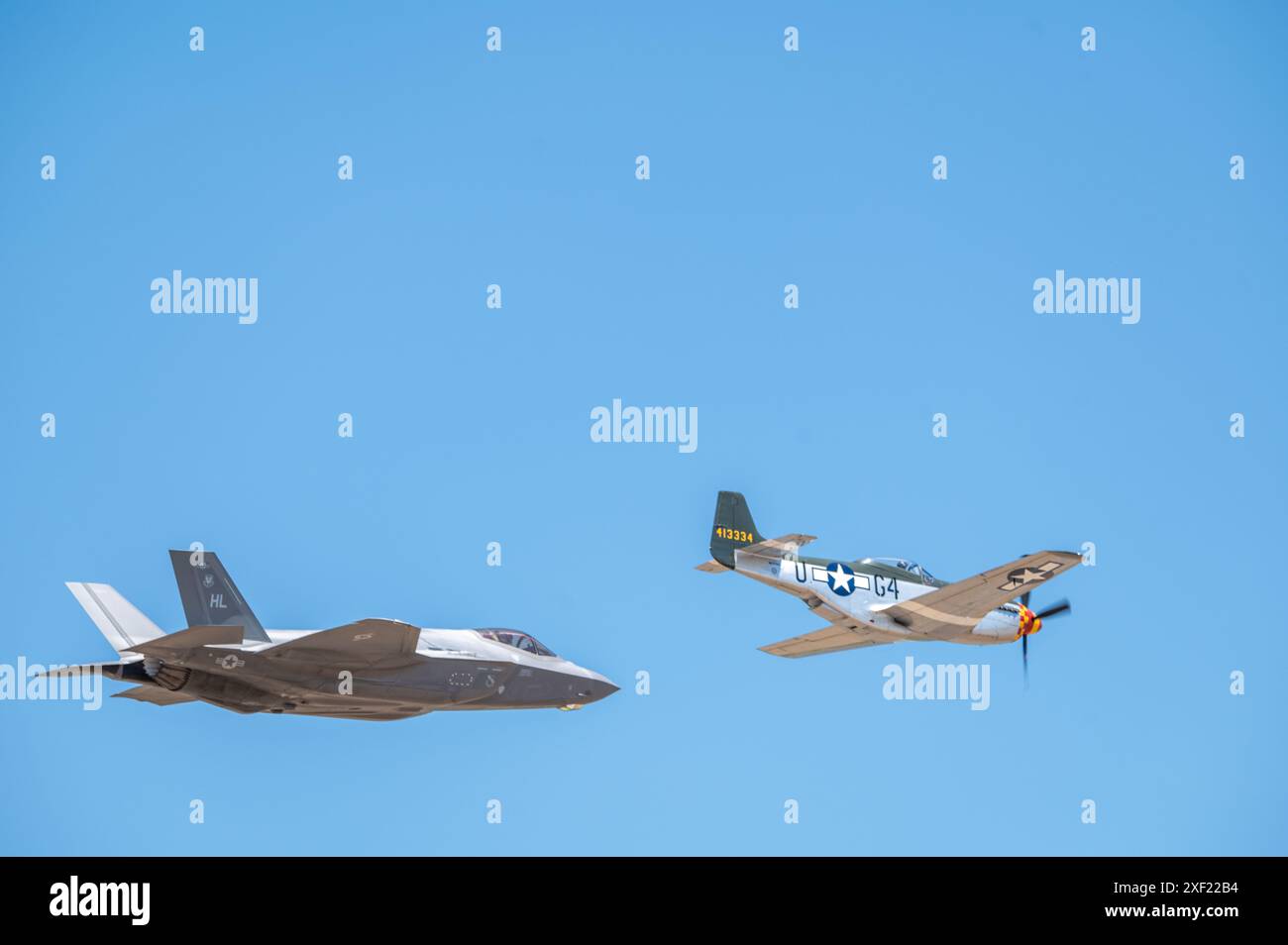 A P-51 Mustang performs a flyover alongside an F-35 Lightning II as ...