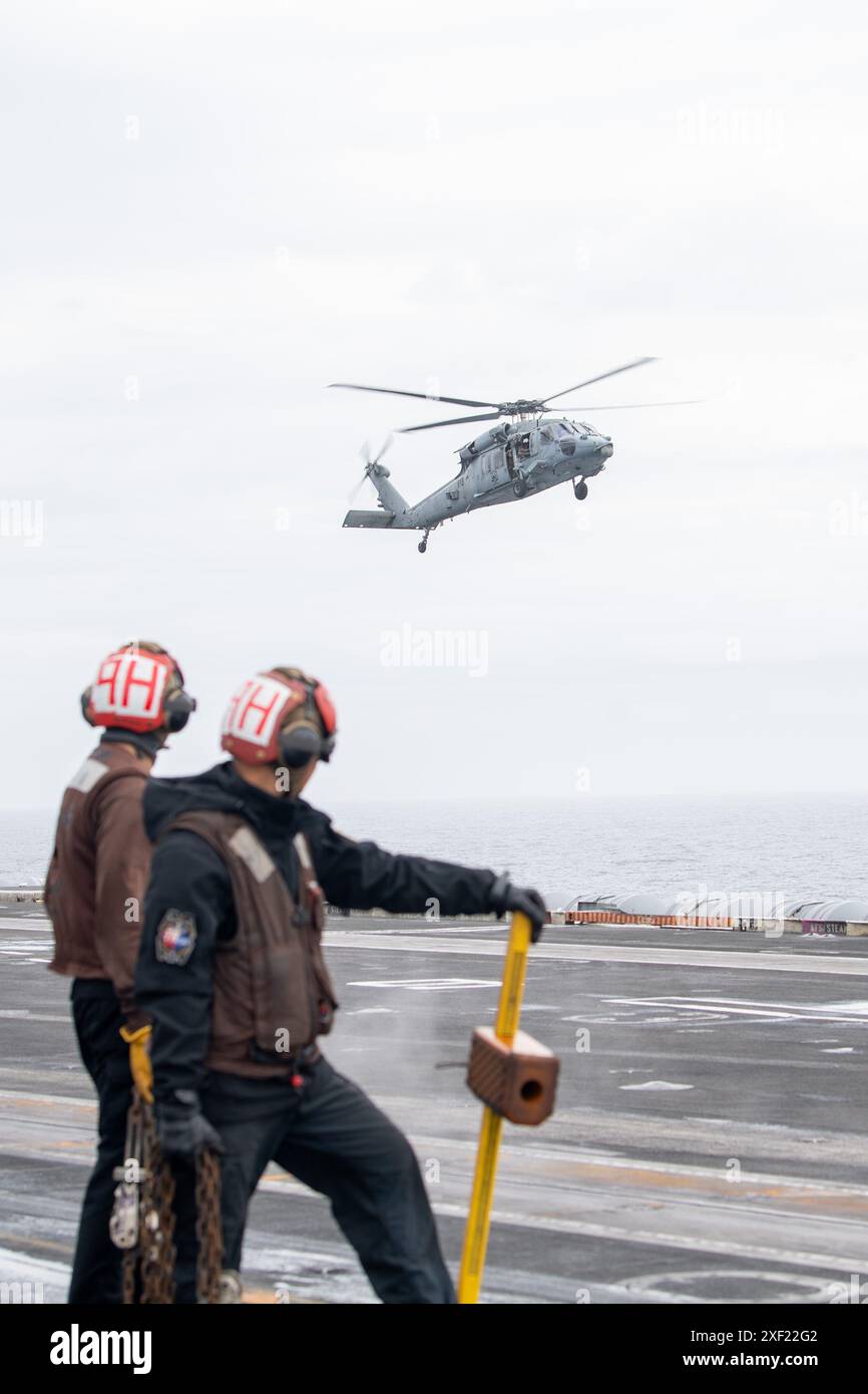 EAST CHINA SEA (June 28, 2024) An MH-60S Sea Hawk, assigned to the ...