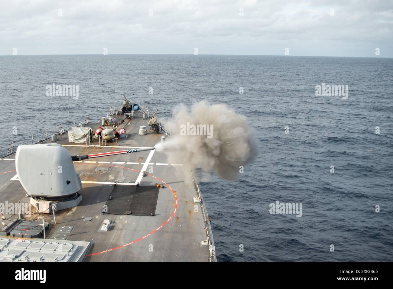 A MK 45 5-inch gun fires aboard Arleigh Burke-class guided-missile ...