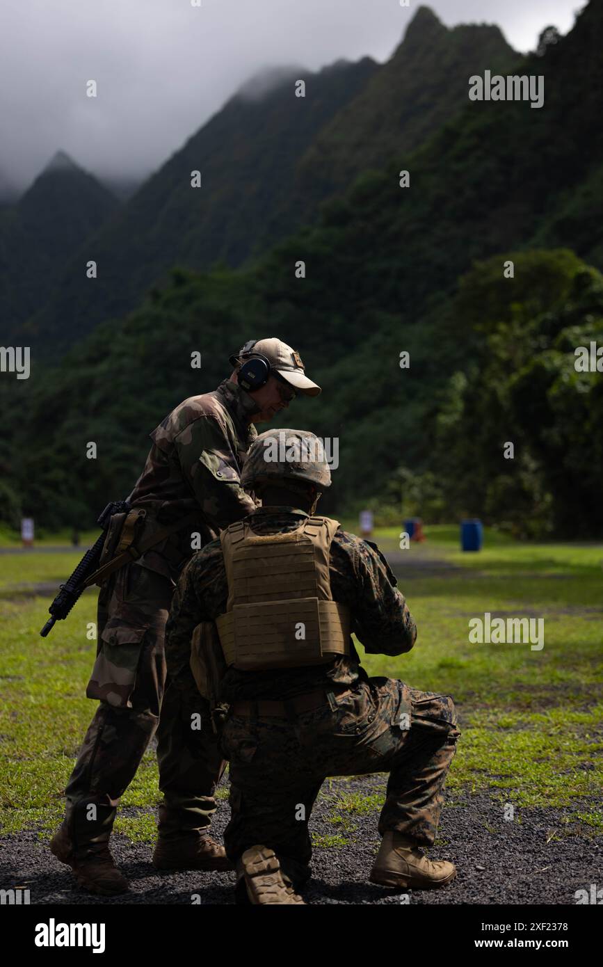 A French soldier, left, with France's Combined Joint Task Force ...