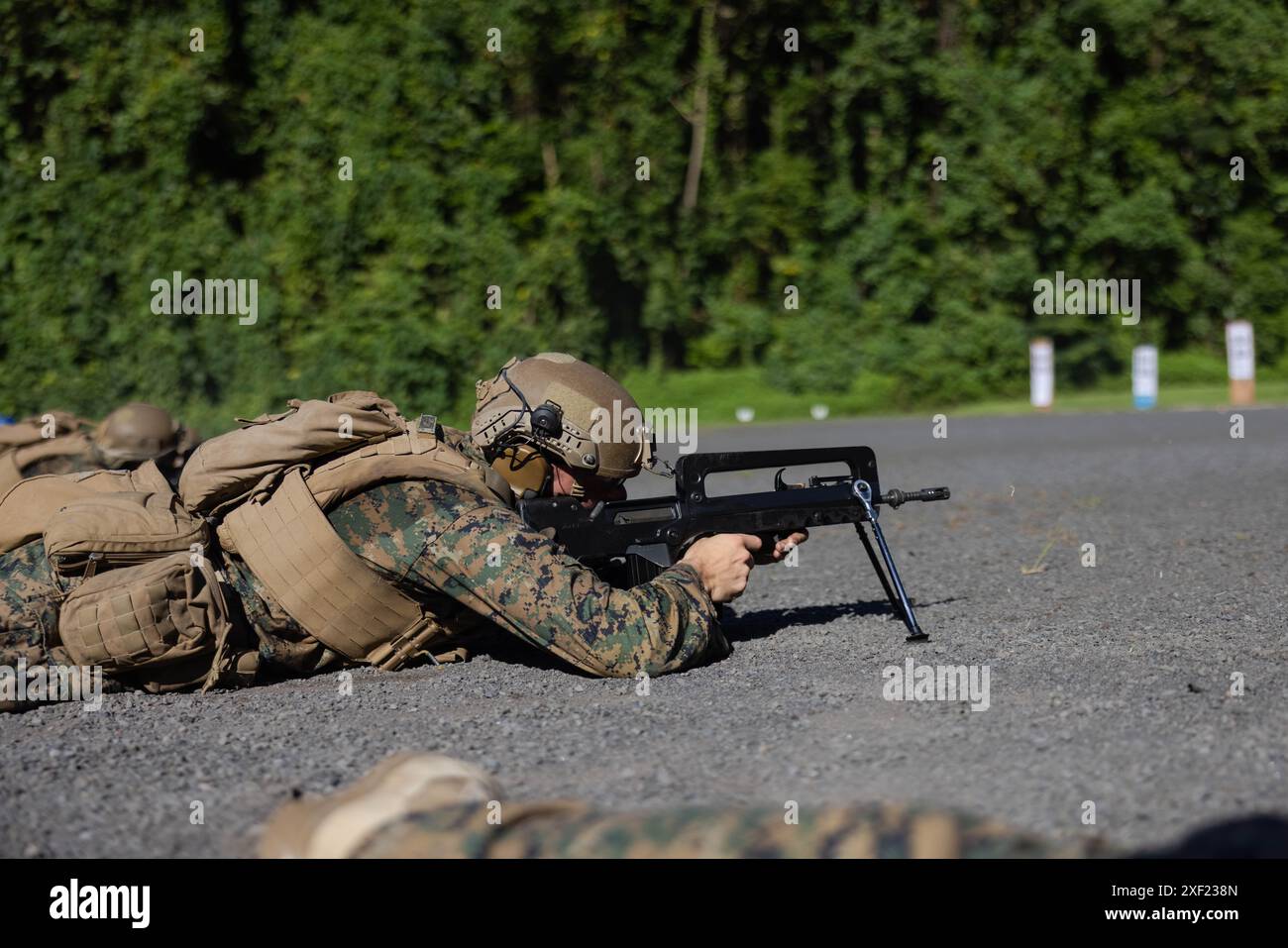 U.S. Marine Corps Lance Cpl. Chris Richardson, an automatic rifleman ...