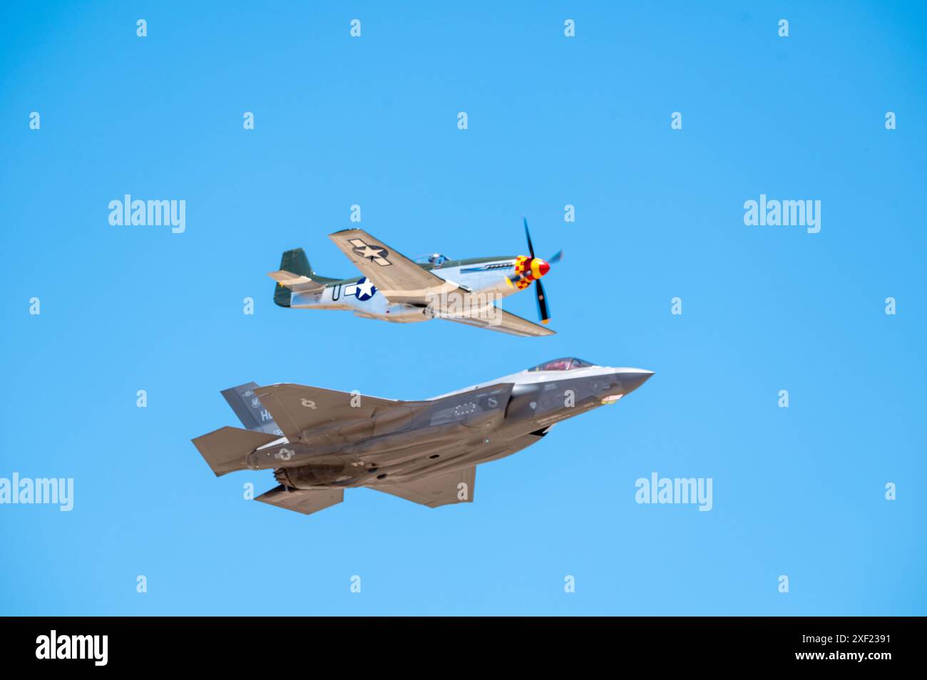 A P-51 Mustang performs a flyover alongside an F-35 Lightning II as ...