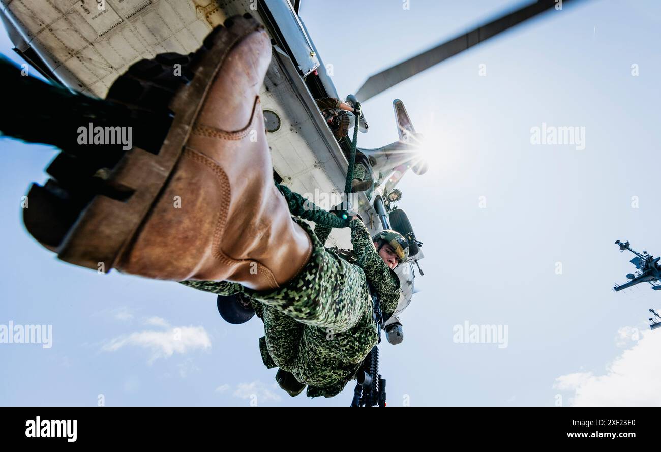 Explosive Ordnance Disposal Technicians, assigned to Explosive Ordnance ...