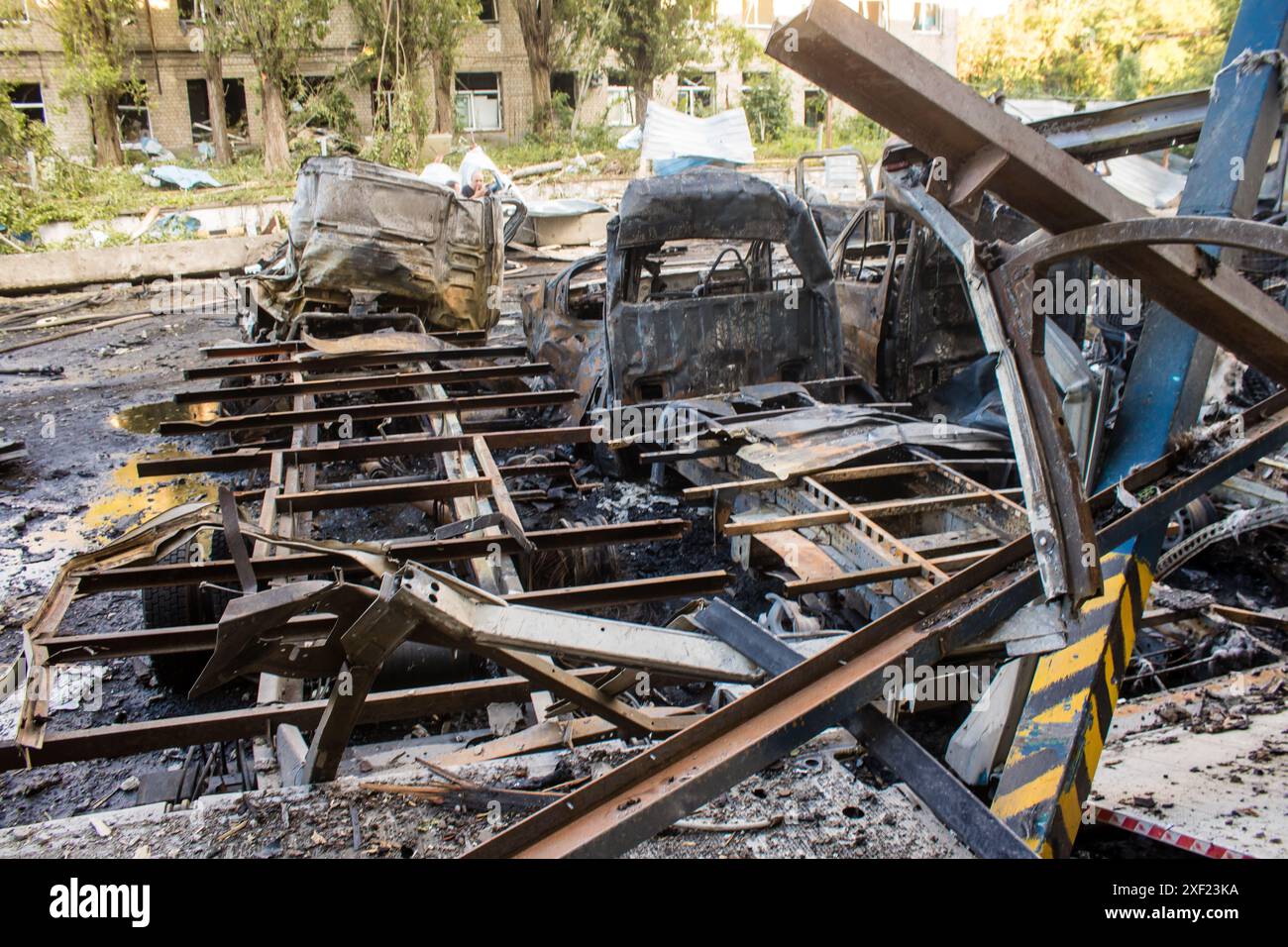 Kharkiv, Ukraine, June 30, 2024 Vehicles burned at the Nova Poshta ...