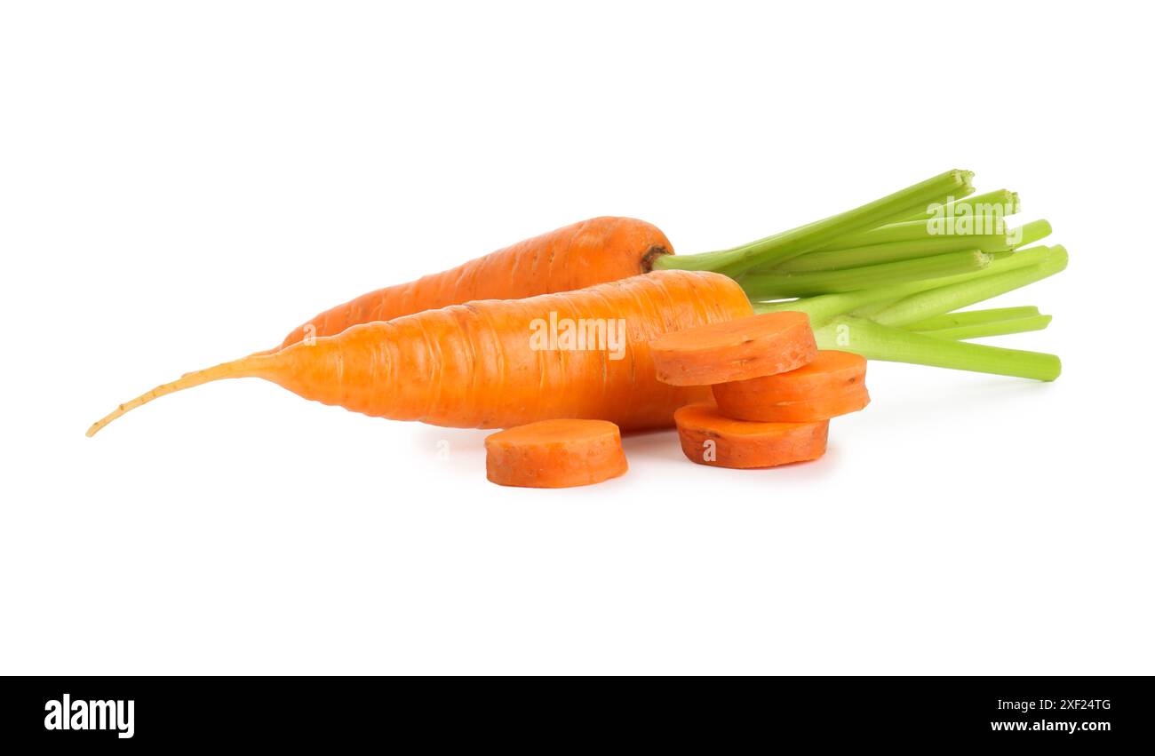 Whole and cut fresh carrots isolated on white Stock Photo - Alamy